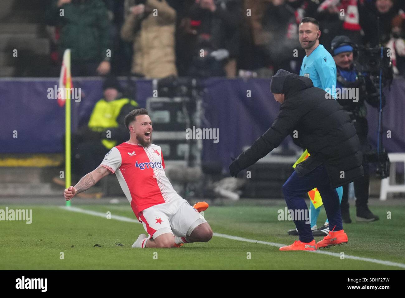 Slavia's Vasil Kusej celebrates after scoring his side's opening goal ...