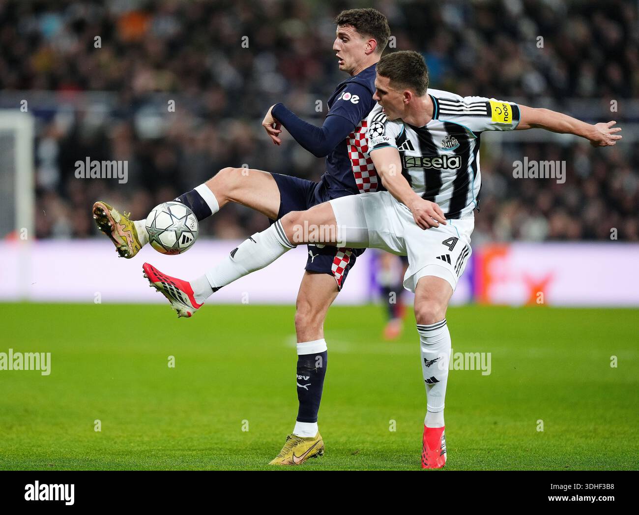 Newcastle United's Sven Botman (right) and PSV Eindhoven's Guus Til ...