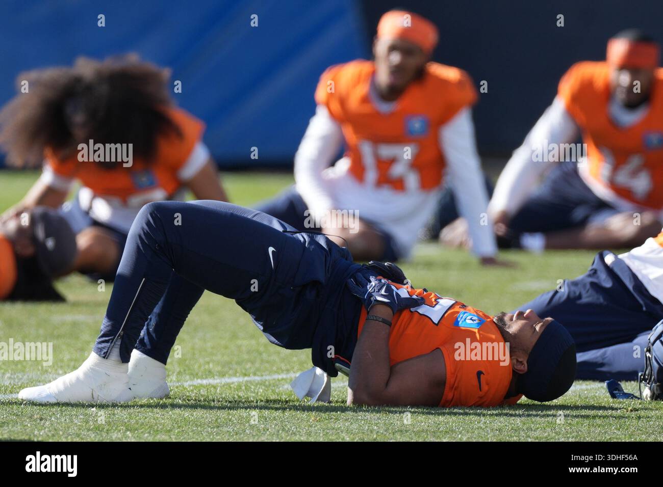 Denver Broncos running back J.K. Dobbins warms up during an NFL ...