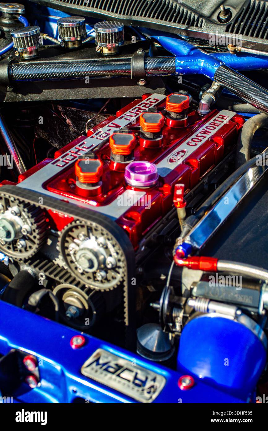 Blue Ford Escort RS Cosworth at a car show. Iconic 90s rally legend ...