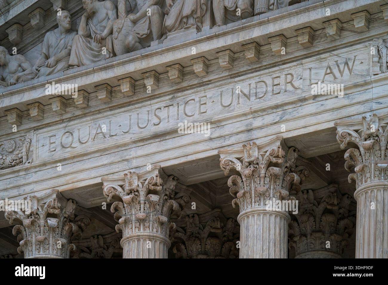 FILE - The west facade of the Supreme Court Building bears the motto ...