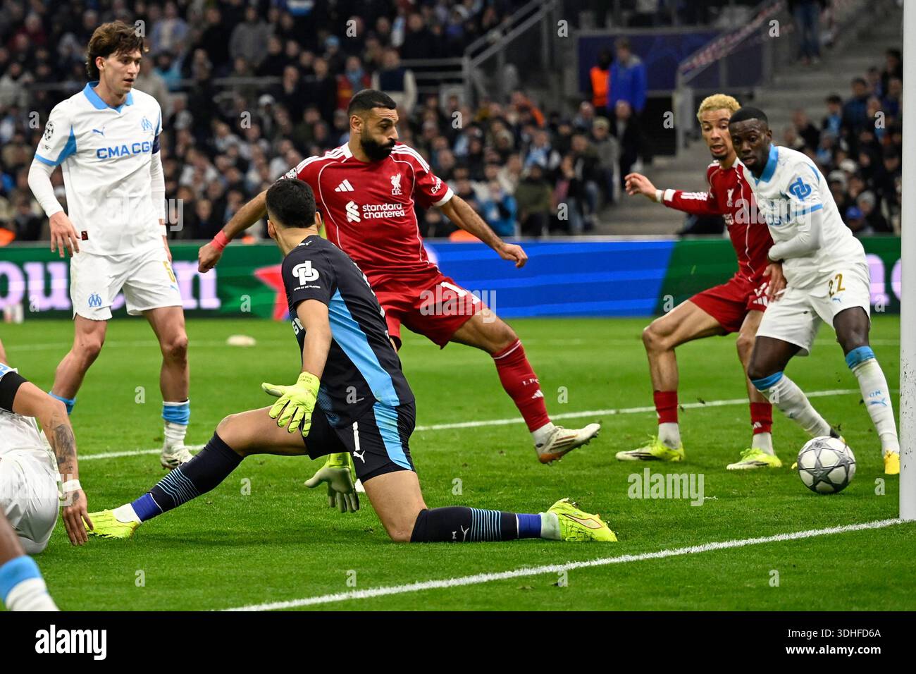 Marseille's goalkeeper Geronimo Rulli, left, scores an own goal during ...