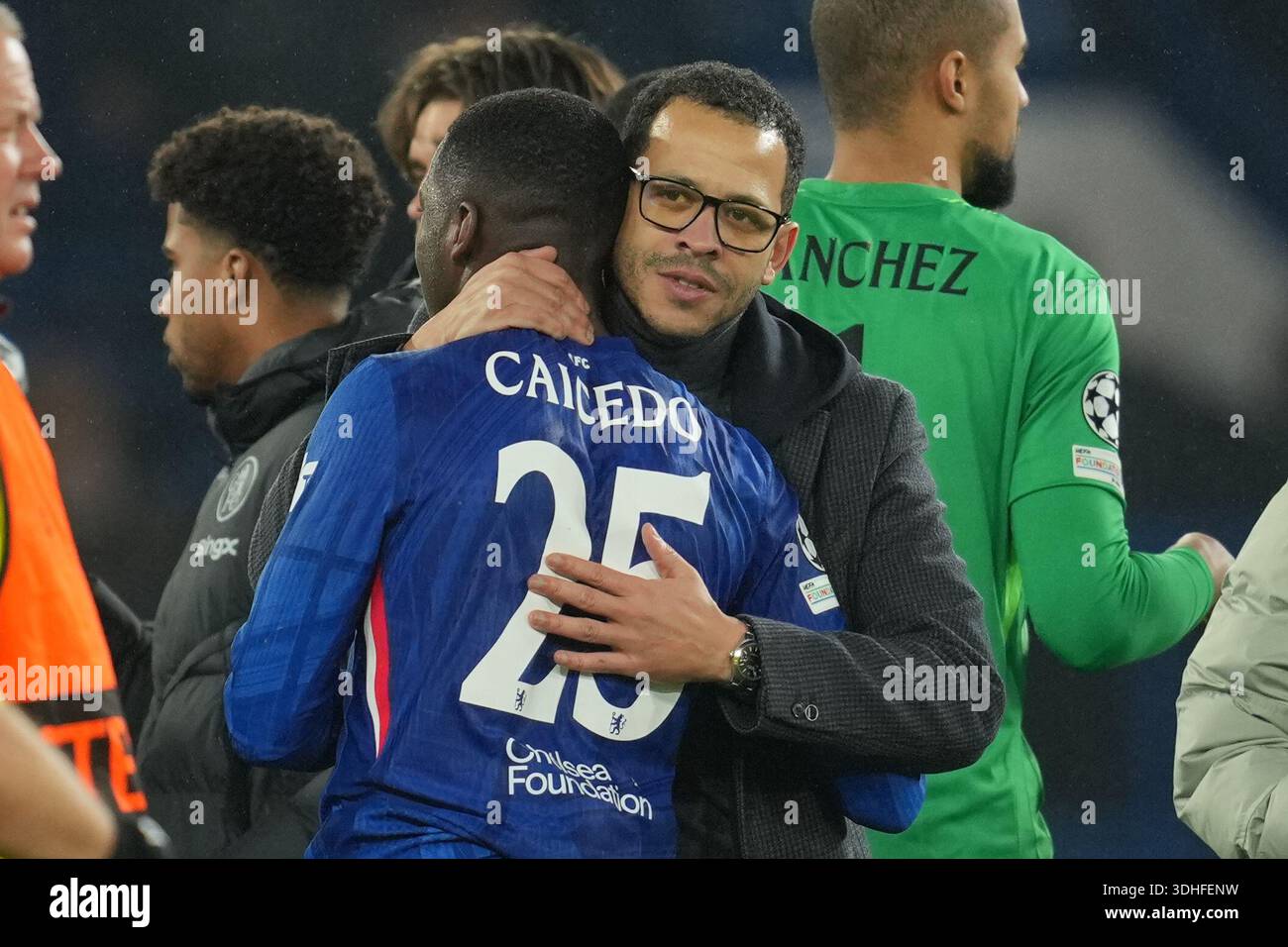 Chelsea's head coach Liam Rosenior hugs Moises Caicedo after the ...