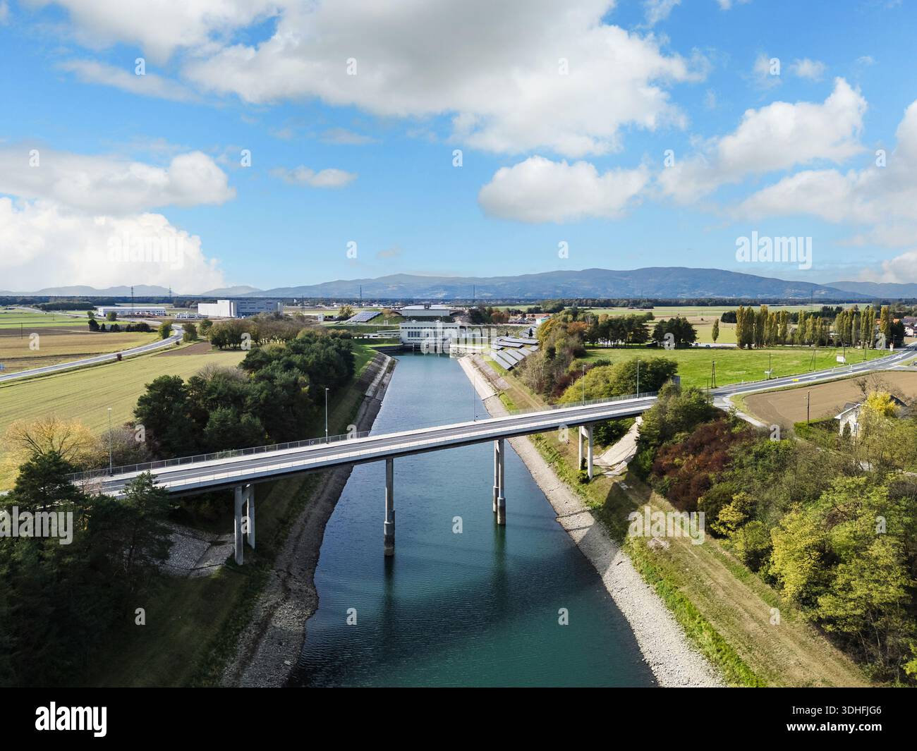 View of a hydro power plant combined with solar panels, highlighting ...