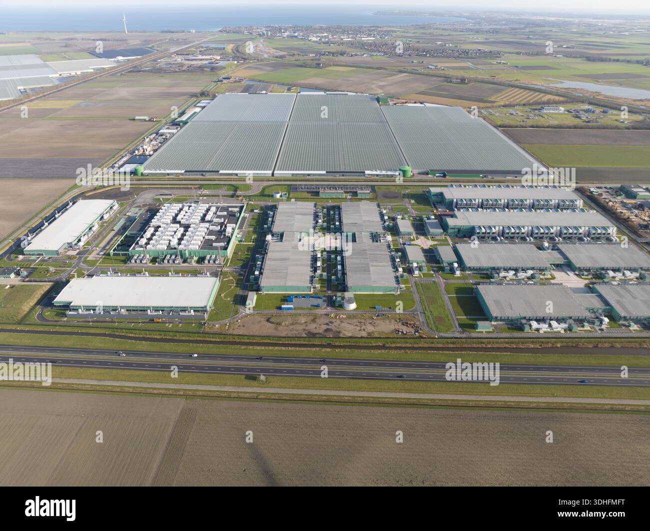 Aerial view modern data center and glass greenhouses Stock Photo - Alamy