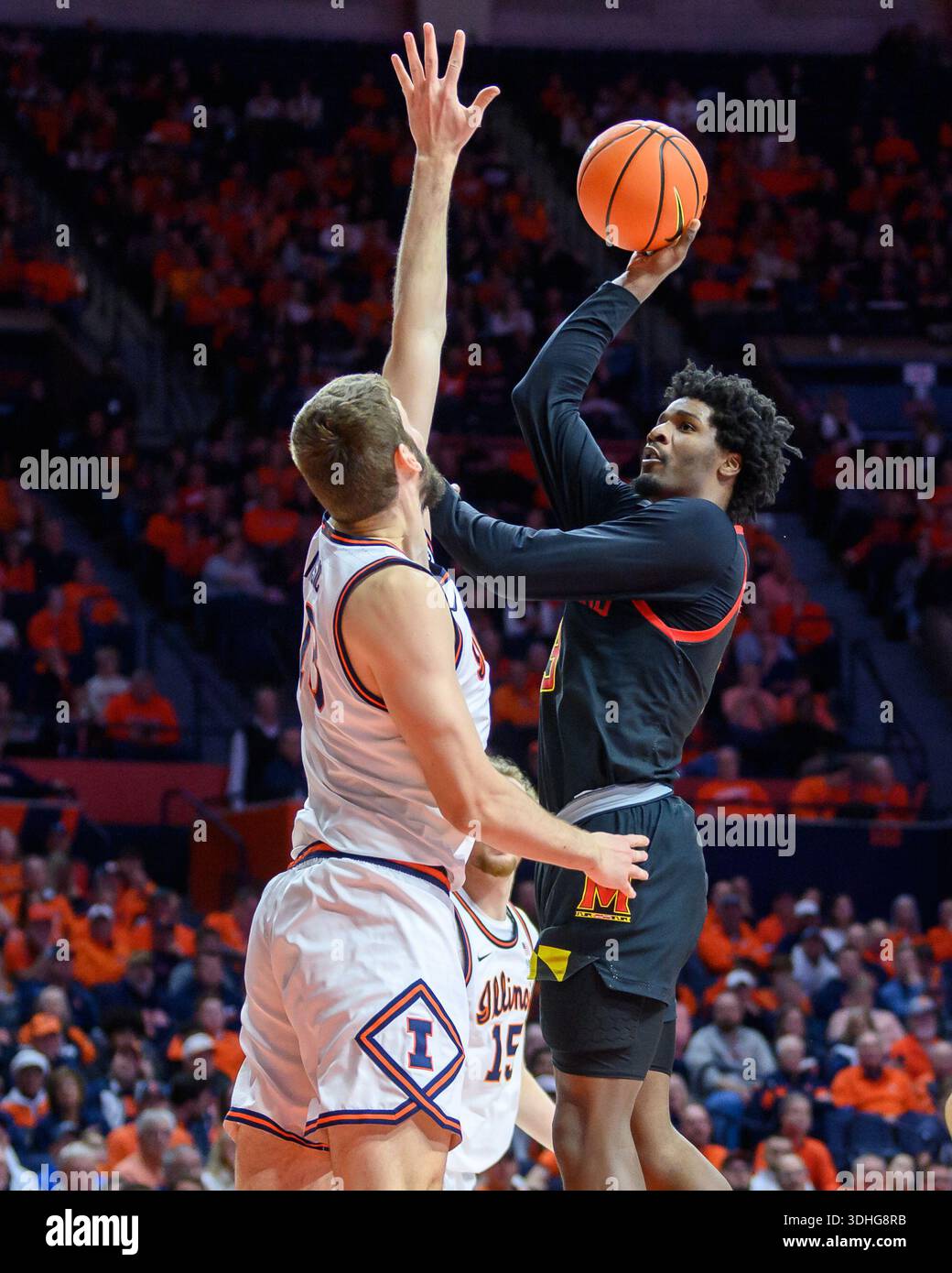 Maryland's Collin Metcalf goes up for a shot against Illinois' Tomislav ...