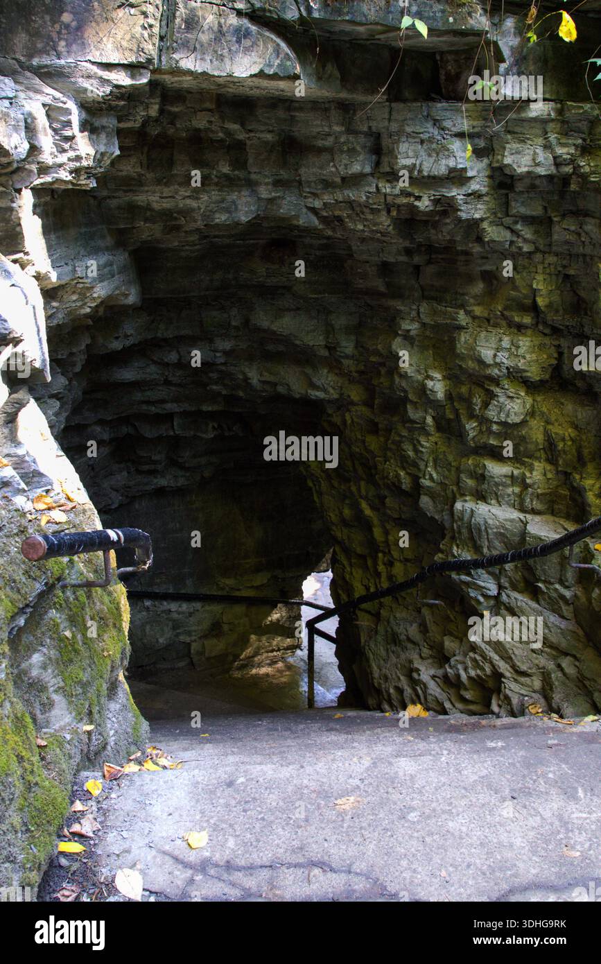 Stone staircase descending inside narrow canyon carved through massive ...