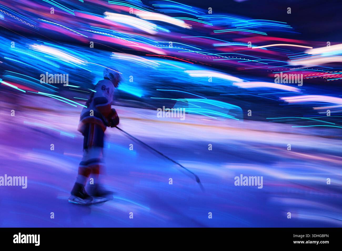New York Islanders center Calum Ritchie skates under pregame lights ...