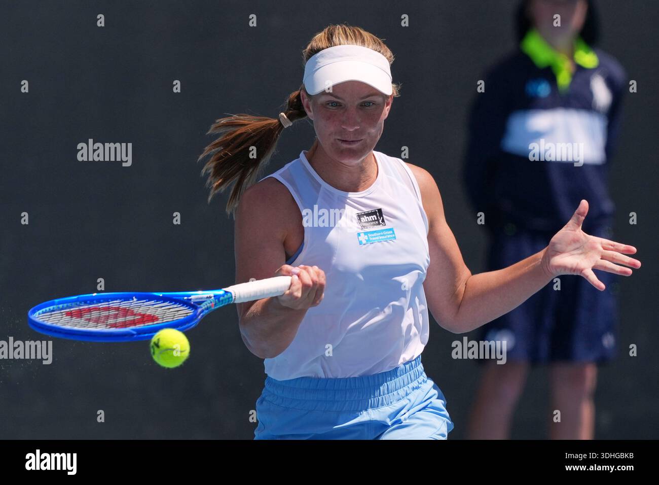 Maddison Inglis of Australia plays a forehand return to Laura Siegemund ...