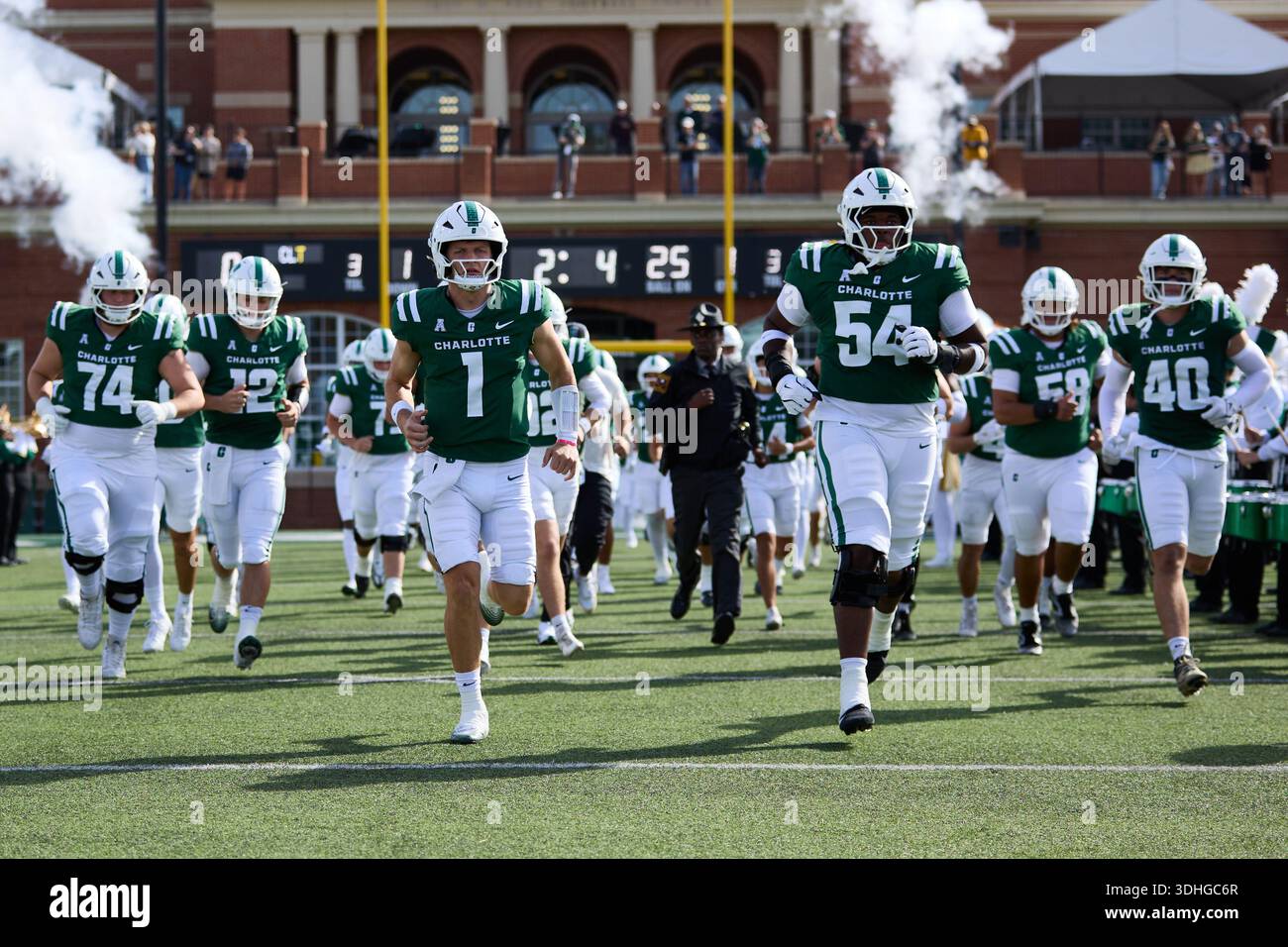 Charlotte offensive lineman Isaac Sikes-Rasby (54) and quarterback Zach ...