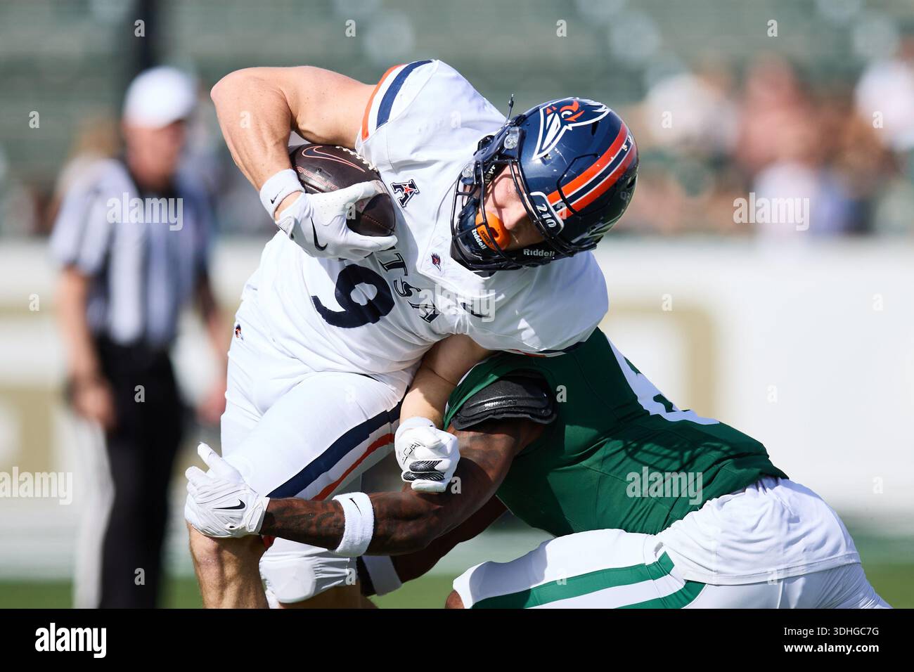 UTSA tight end Patrick Overmyer (9) is tackeld by Charlotte defensive ...