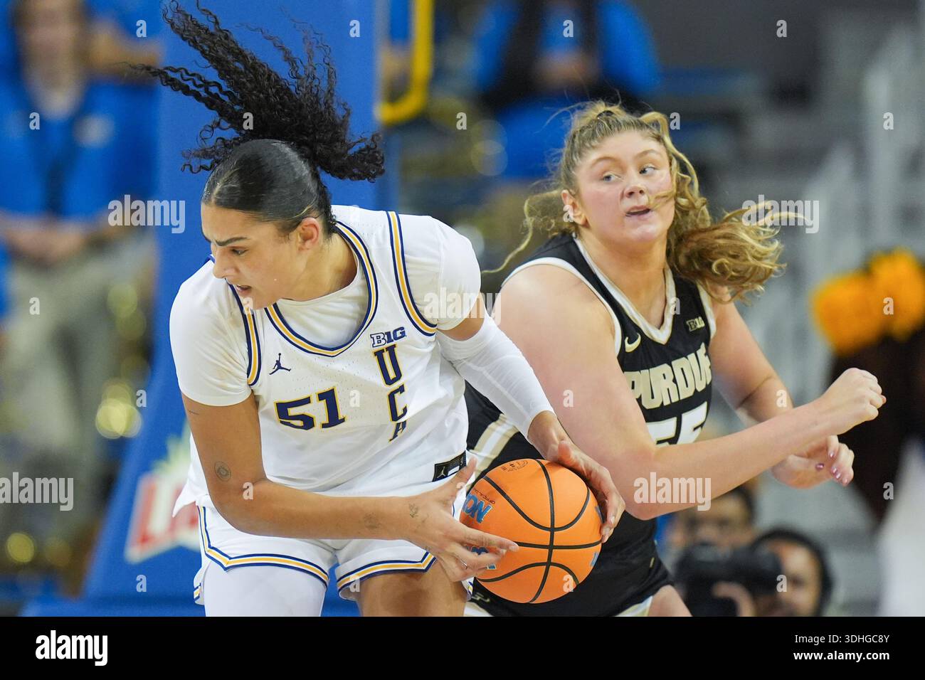 UCLA center Lauren Betts (51) works around Purdue forward Avery Gordon ...