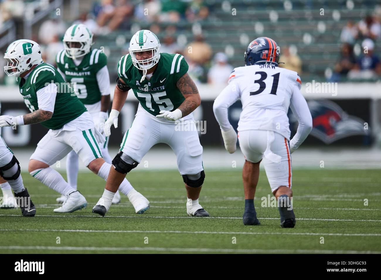 Charlotte offensive lineman Kristos Fernandez (75) prepares to block ...