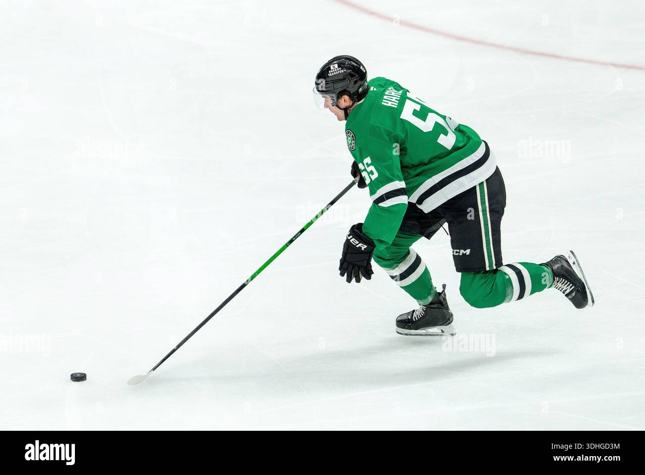Dallas Stars defenseman Thomas Harley brings the puck up the ice during ...