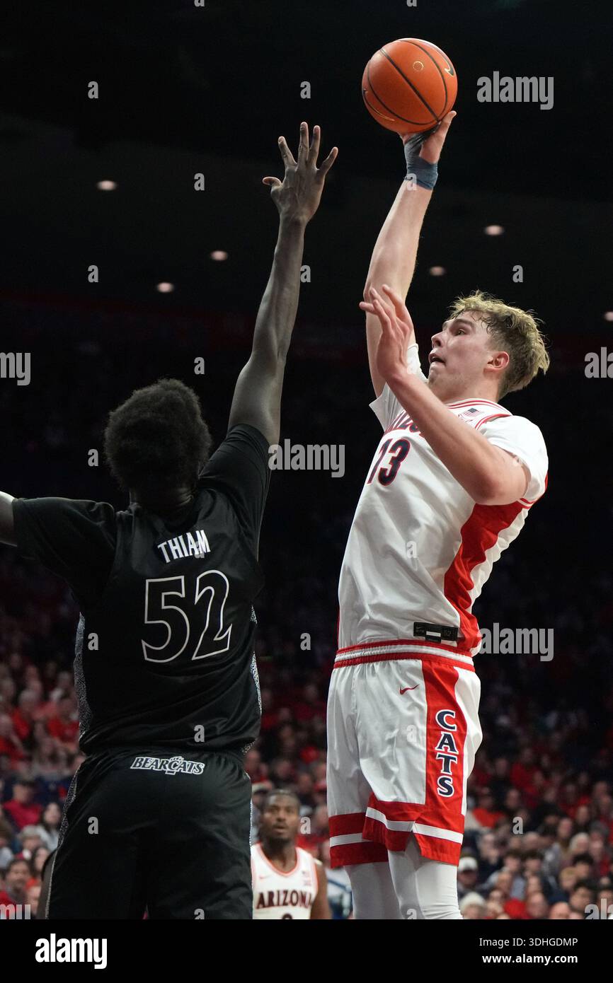Arizona center Motiejus Krivas (13) shoots over Cincinnati center ...