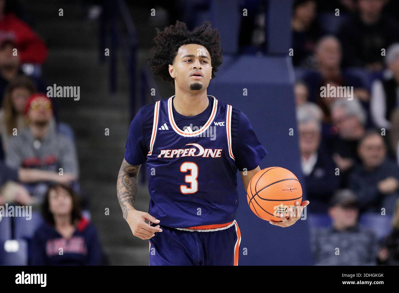 Pepperdine guard Aaron Clark (3) controls the ball during the second ...