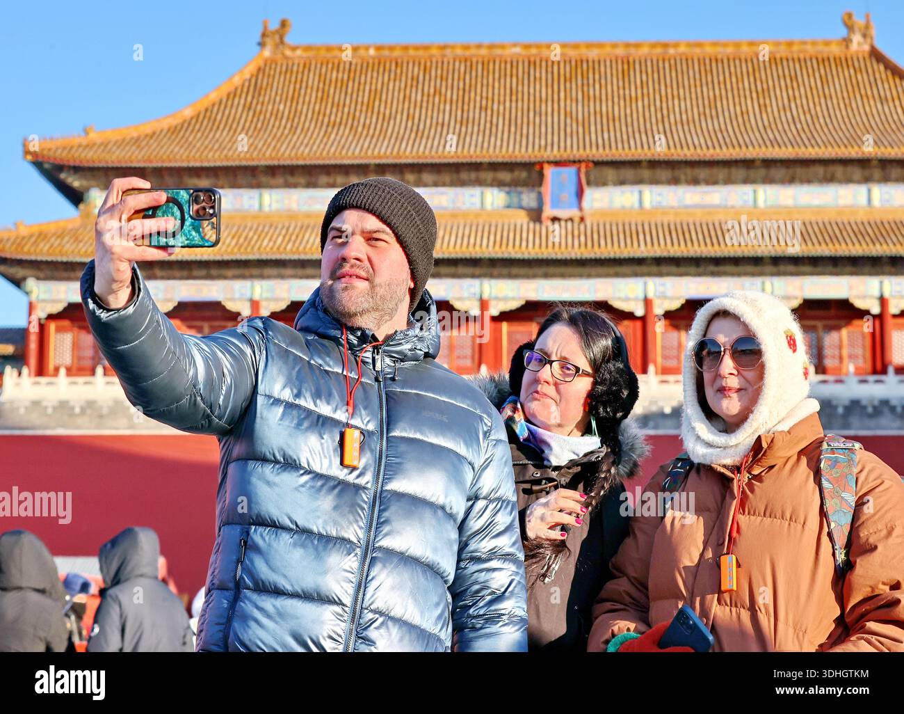 Tourists bundle up to visit the Forbidden City in Beijing, China. 20th ...