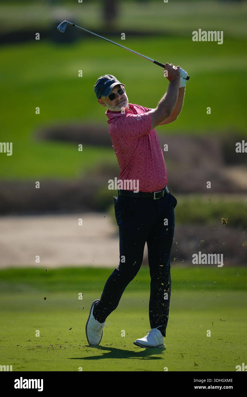 Paul Waring of England plays his second shot on the 16th hole during ...