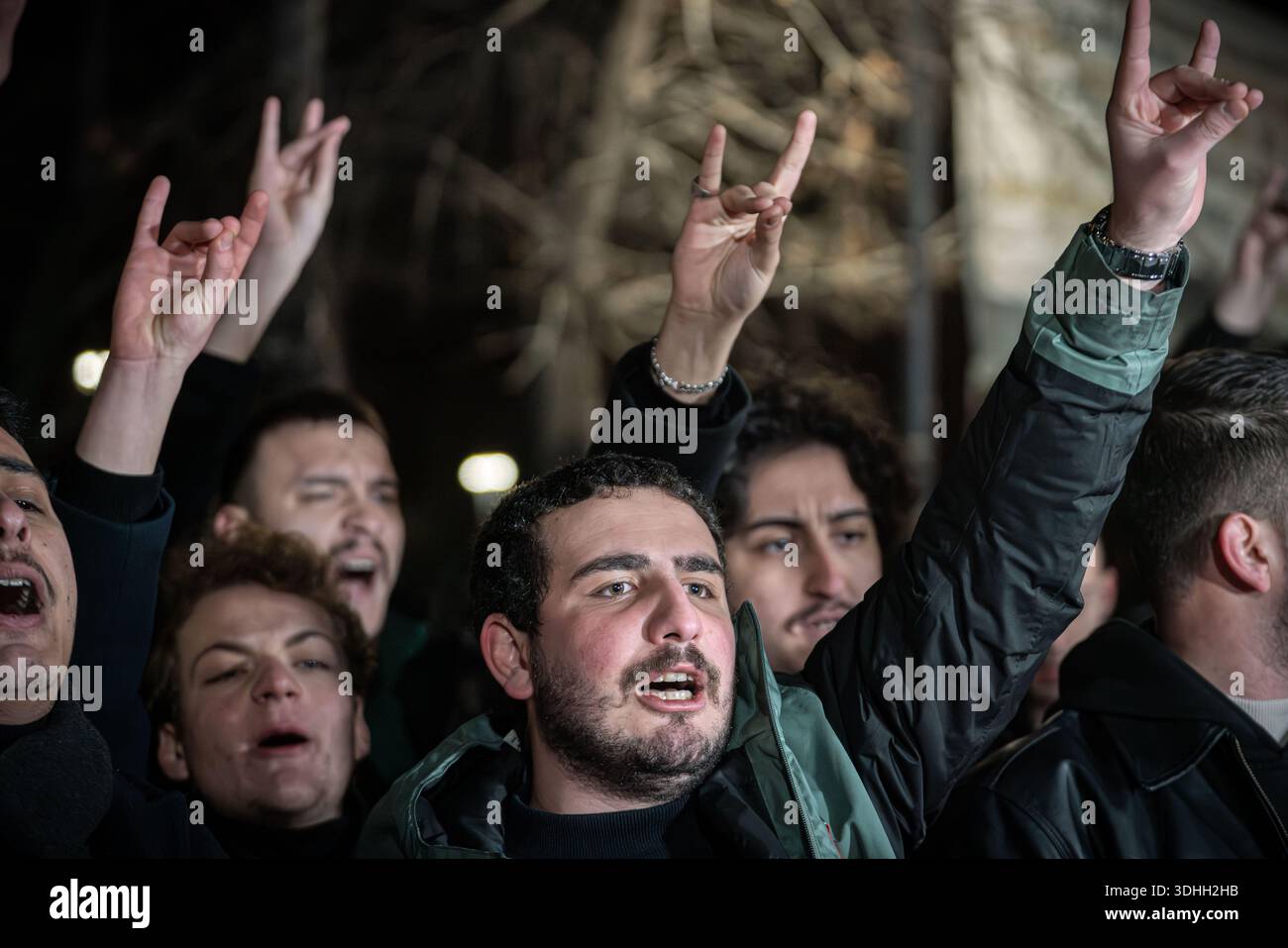 Ankara, Turkey. 21st Jan, 2026. Protesters make the "grey wolf" sign, a ...
