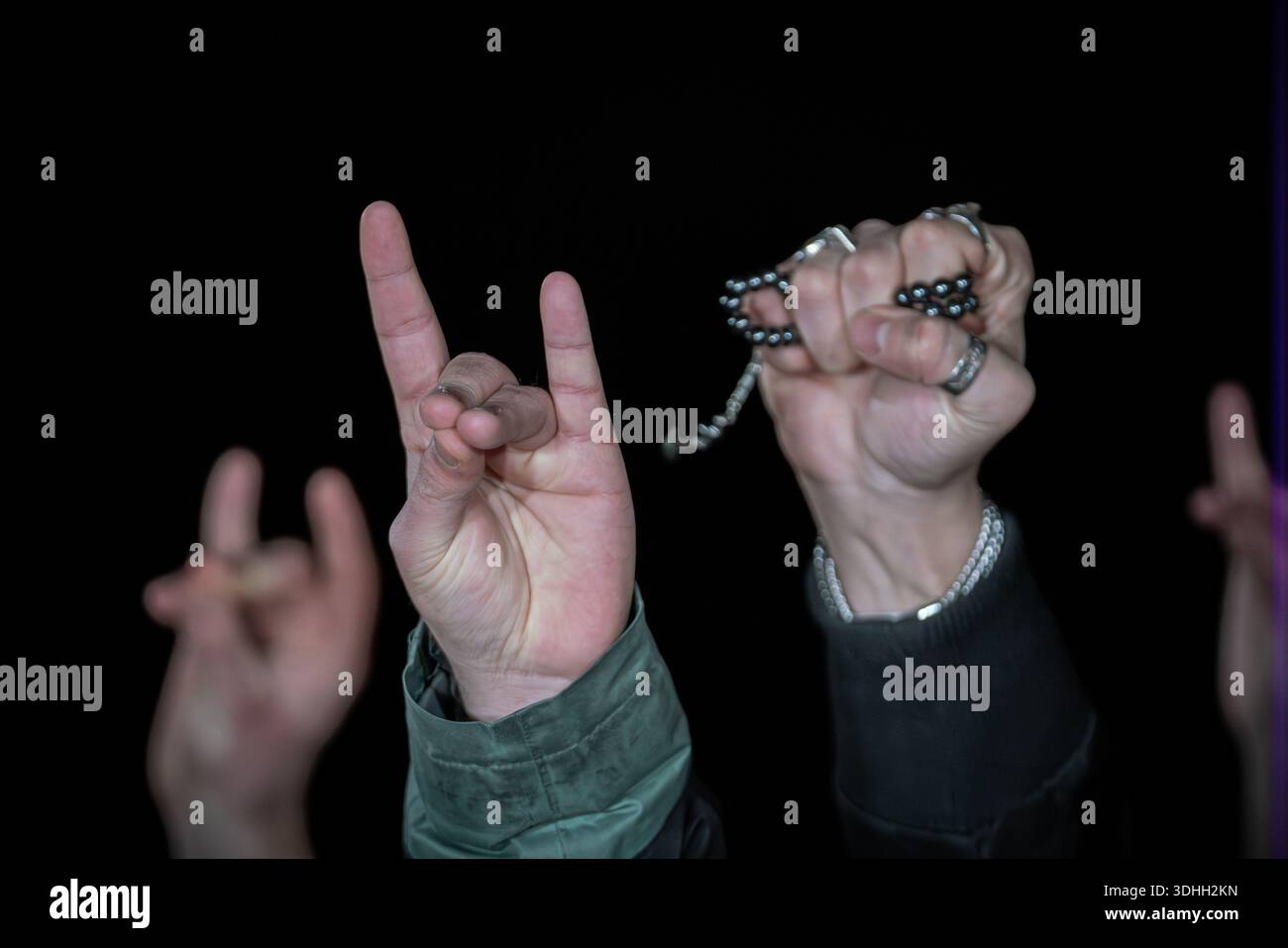Ankara, Turkey. 21st Jan, 2026. A protester makes the "grey wolf" sign ...