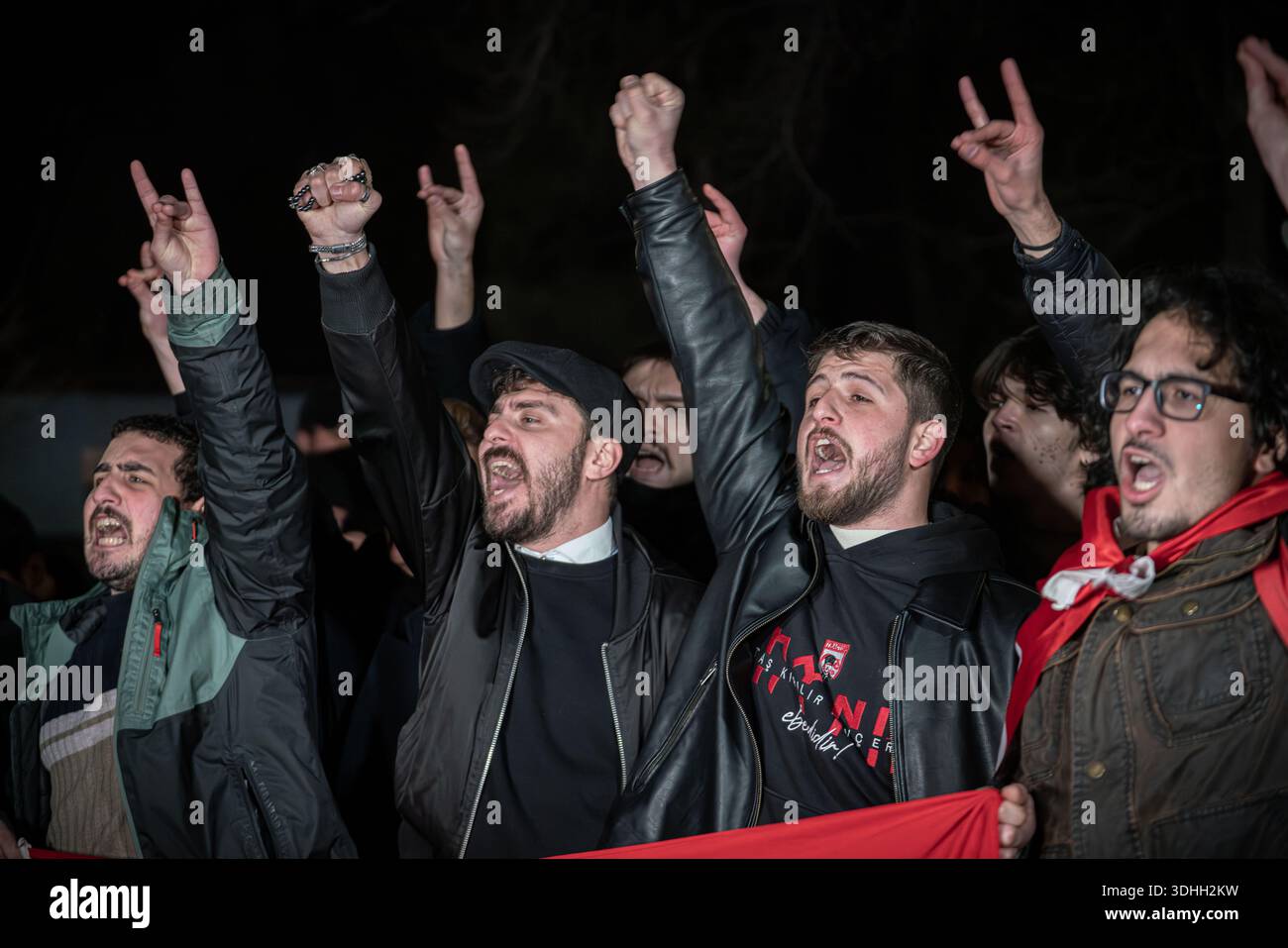 Ankara, Turkey. 21st Jan, 2026. Protesters make the "grey wolf" sign, a ...