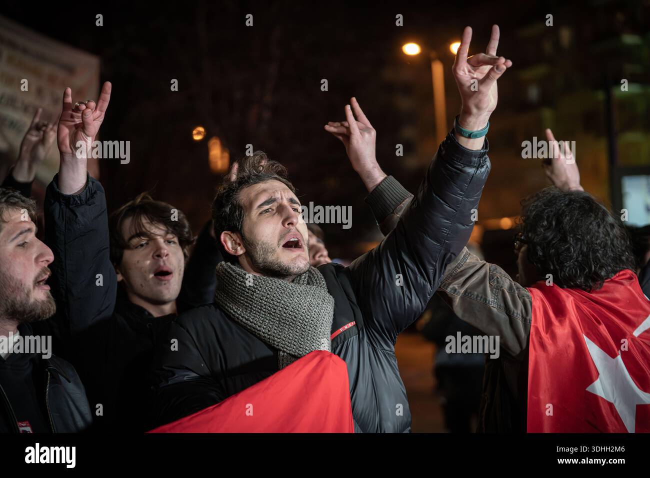 Ankara, Turkey. 21st Jan, 2026. Protesters make the "grey wolf" sign, a ...