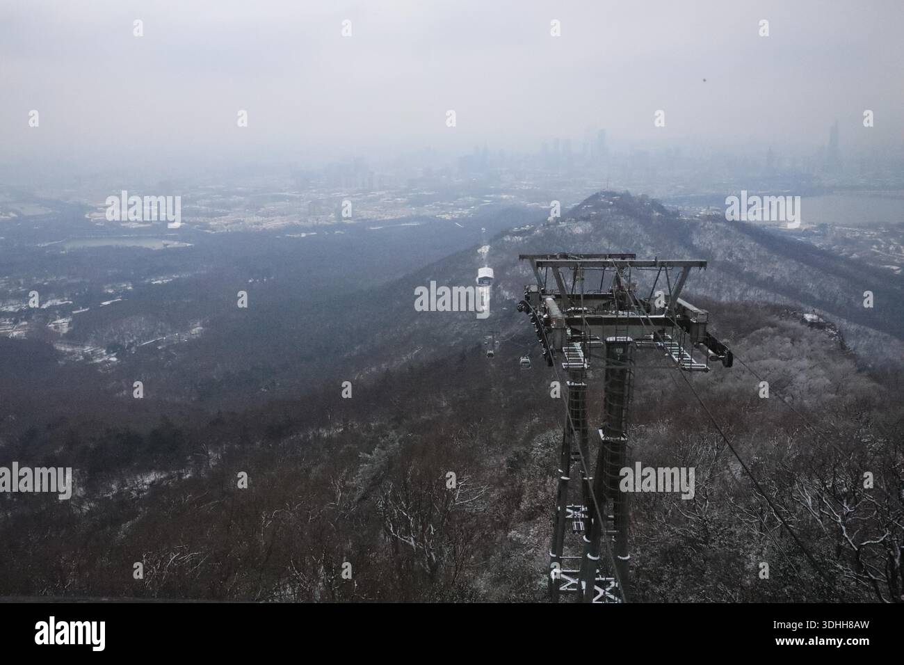 Zijin Mountain is covered with snow and ice after a heavy snowfall in ...