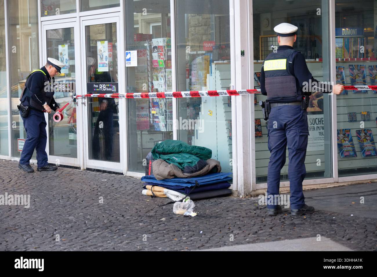 Aachen, Germany. 22nd Jan, 2026. Police officers close off access to ...