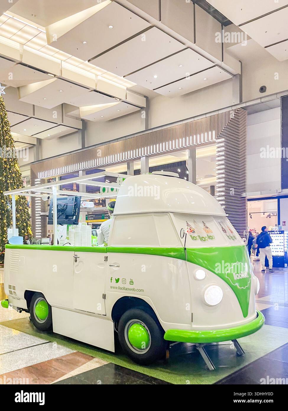 Malaga, Spain - December 21, 2025: Retro VW ice cream van with a green ...