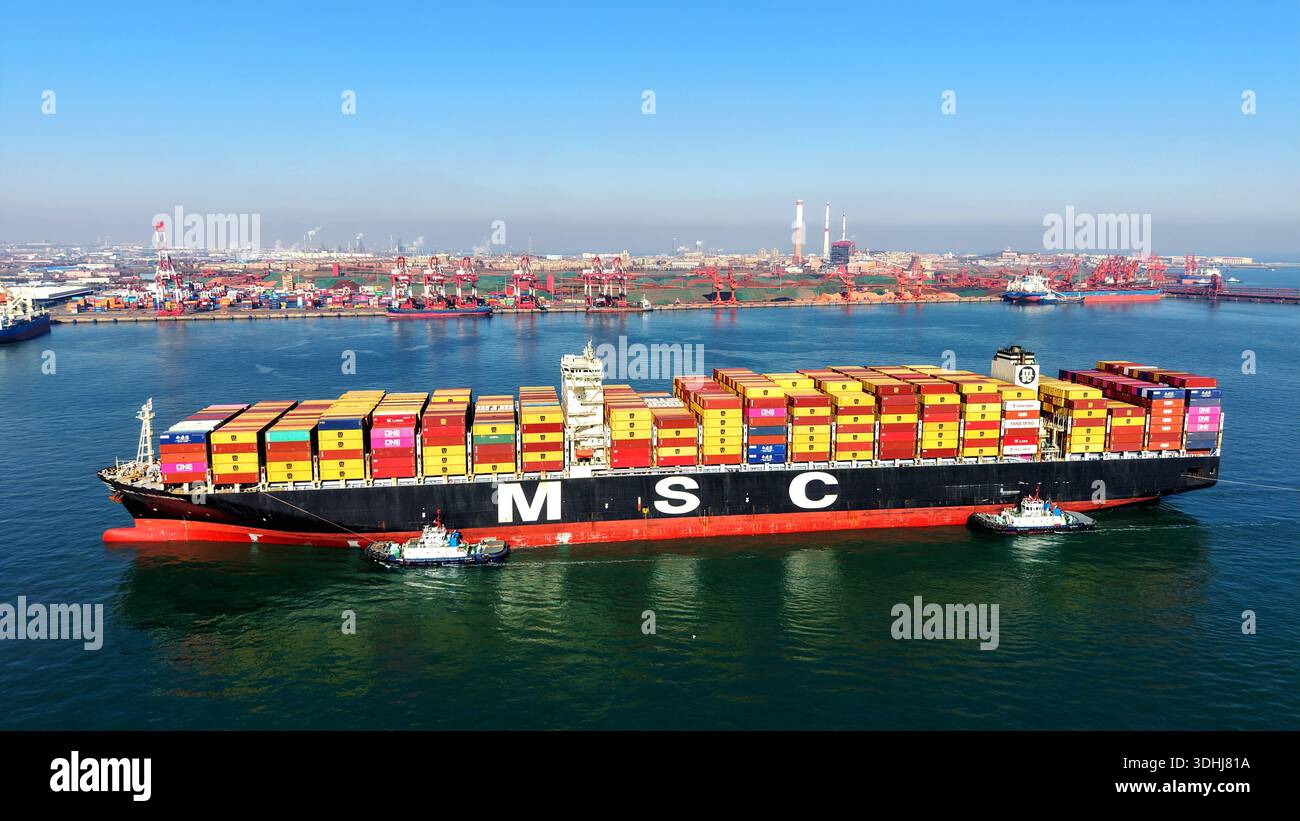 An MSC container ship sails into the harbor in Qingdao in eastern China ...