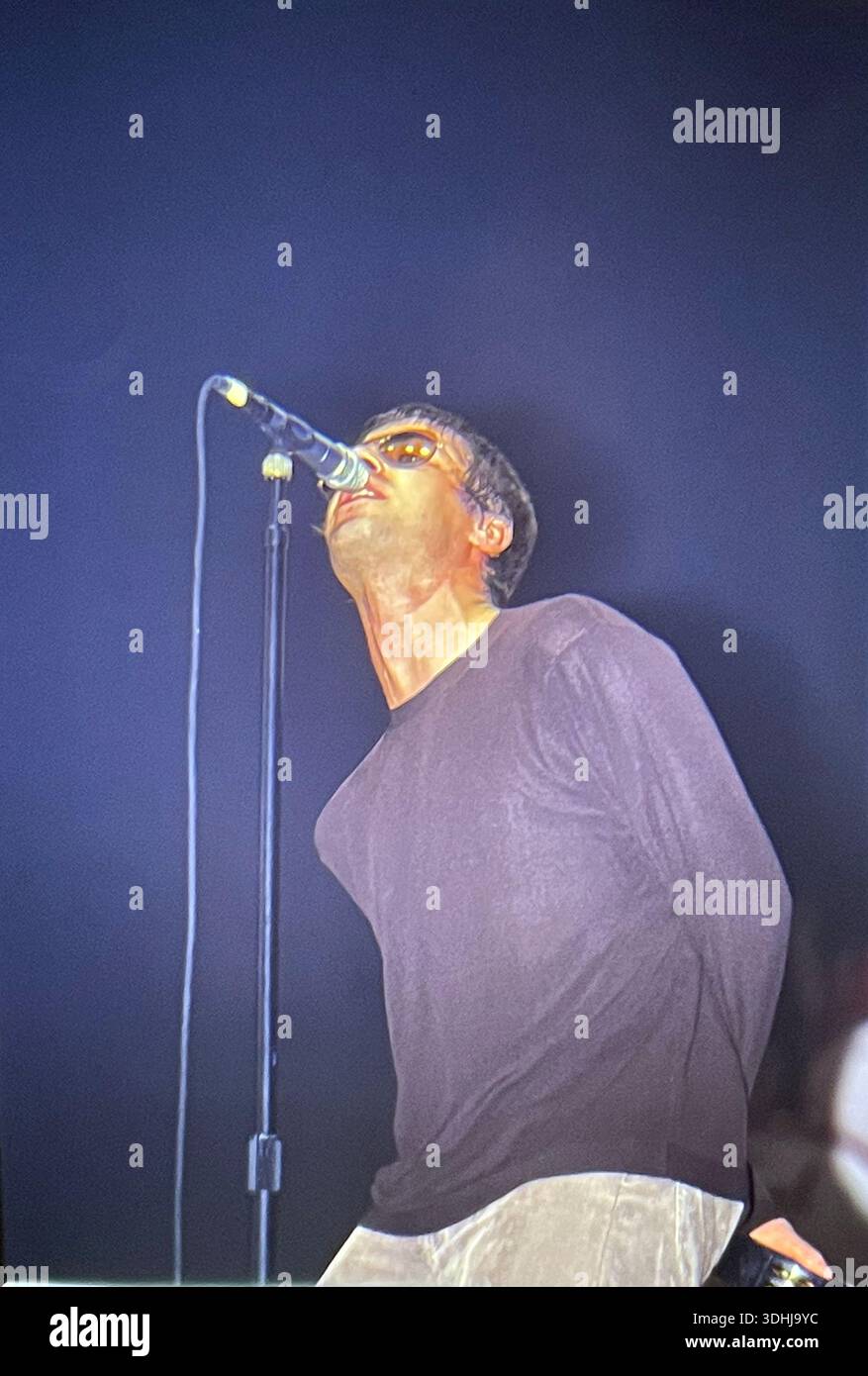 Liam Gallagher of Oasis live on stage at Earl's Court in London on the ...