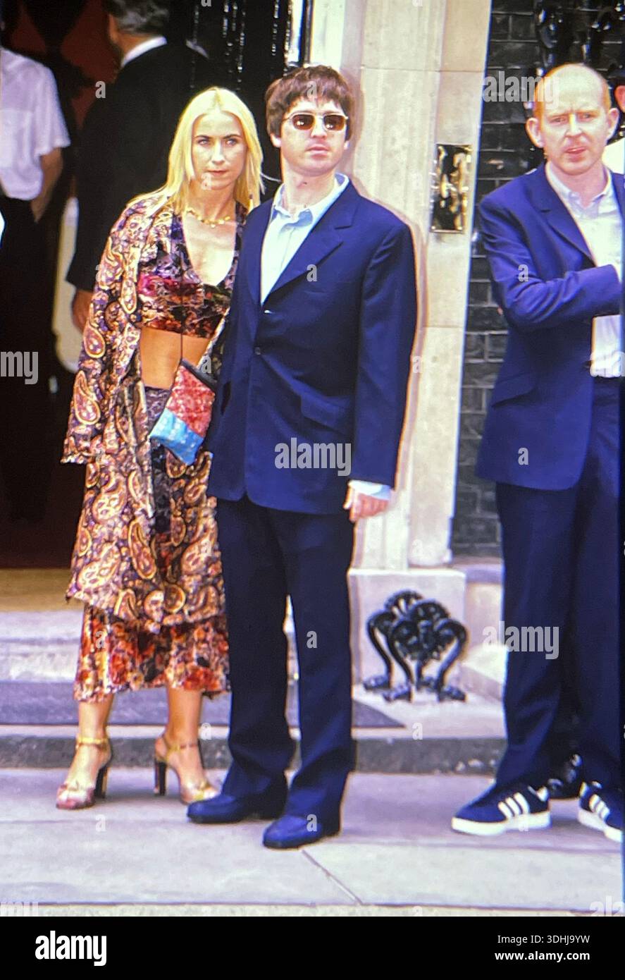 Noel Gallagher of Oasis with his wife Meg Matthews and band manager ...