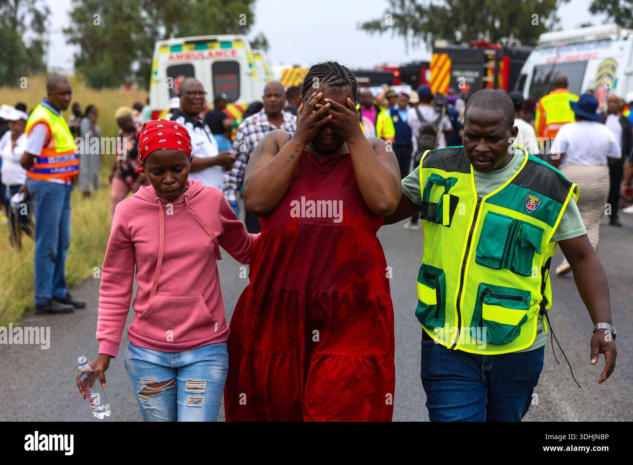 FILE - Relatives of school children, who died when the minibus they ...