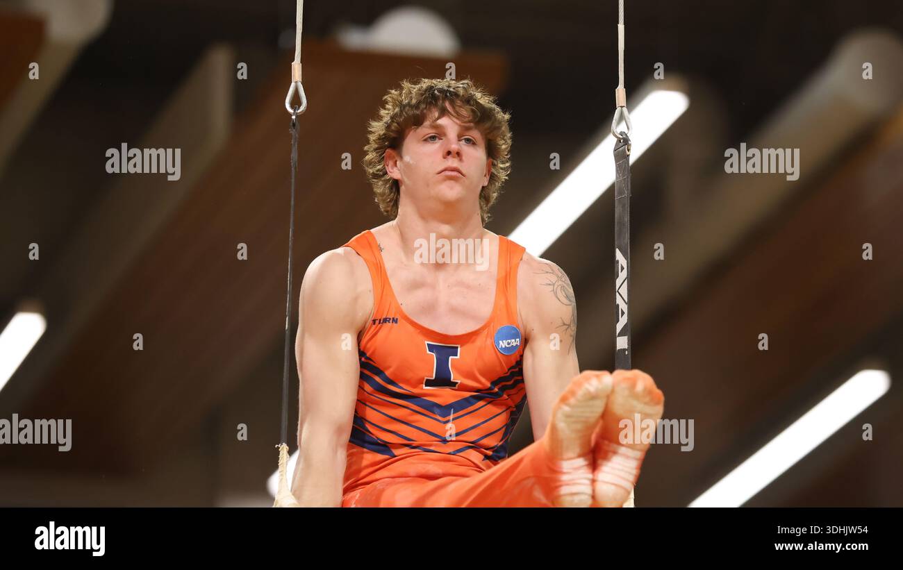 Illinois gymnast Garrett Schooley competes during an NCAA gymnastics ...