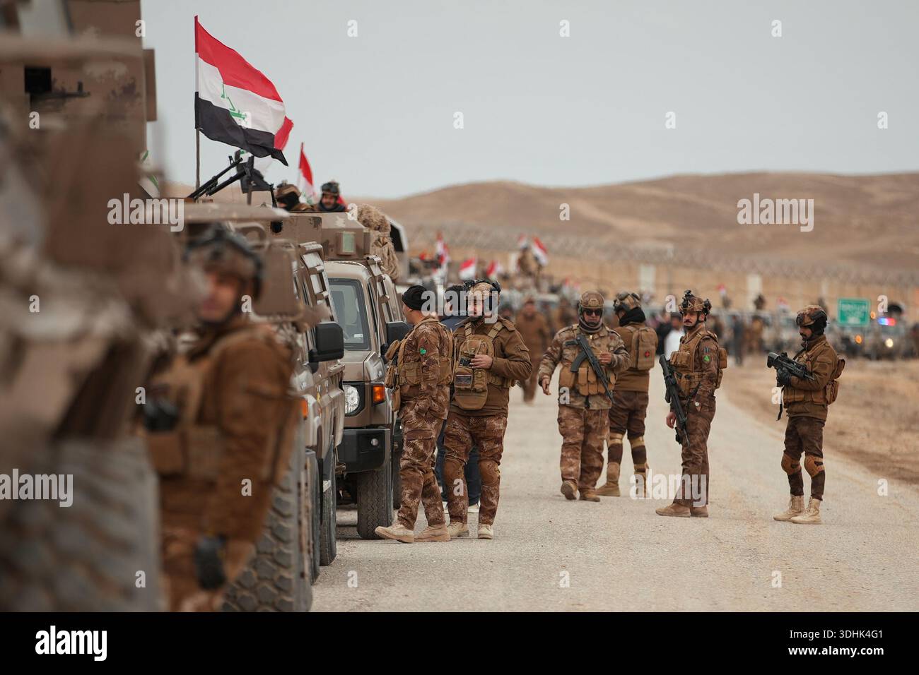 Iraqi Border Guards patrol along the border with Syria, in Sinjar ...