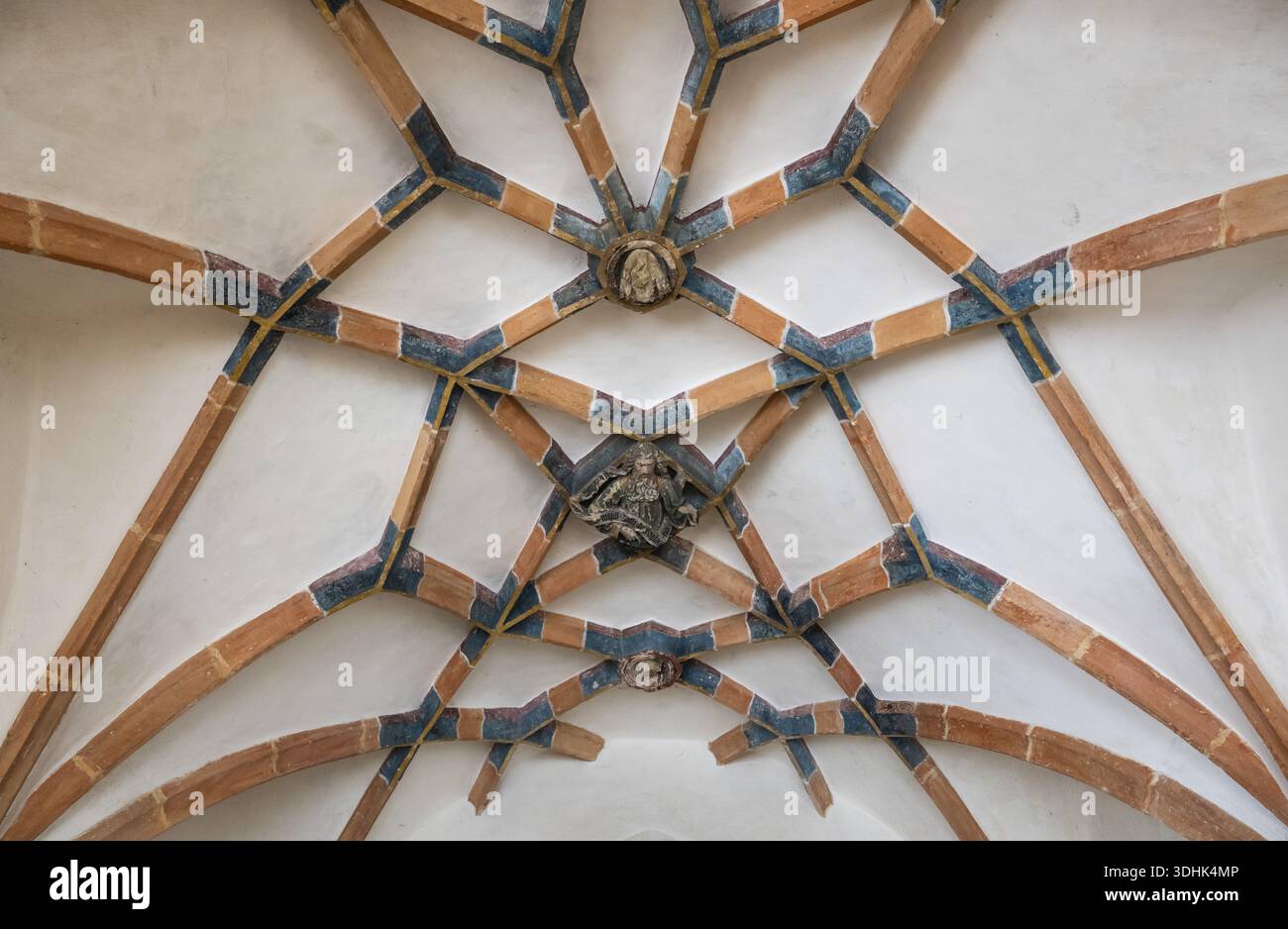 Net vault with keystones depicting God, John the Baptist and Jesus ...