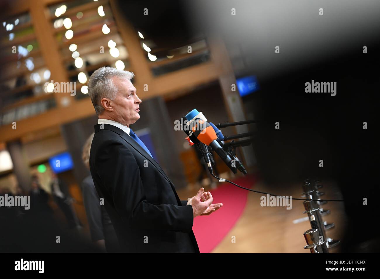 Lithuania's President Gitanas Nauseda speaks with the media as he ...