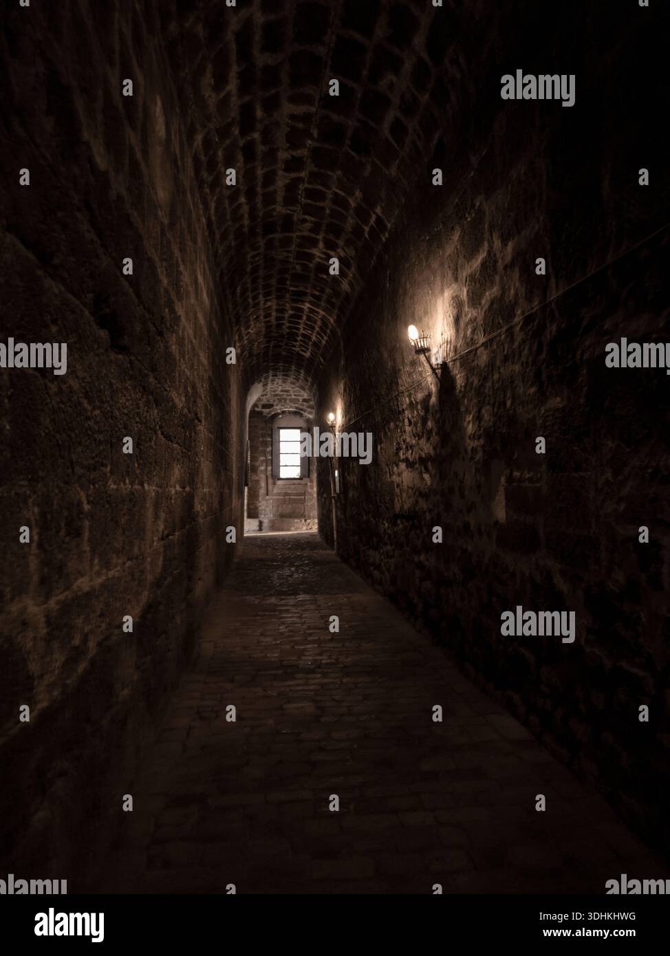 Medieval arched cobblestone corridor hi-res stock photography and ...