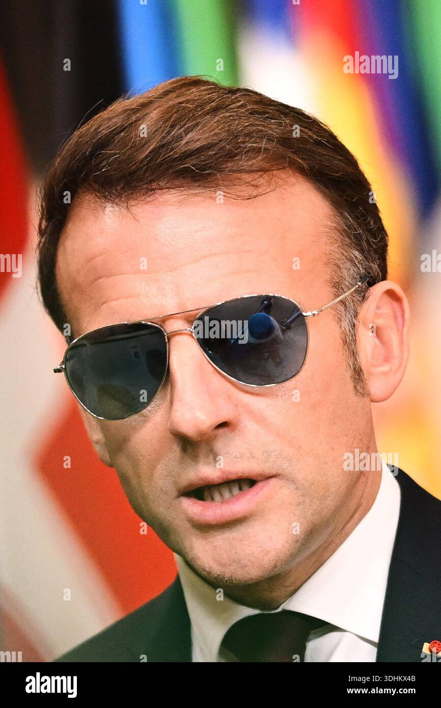 French President Emmanuel Macron arrives for the EU summit in Brussels ...
