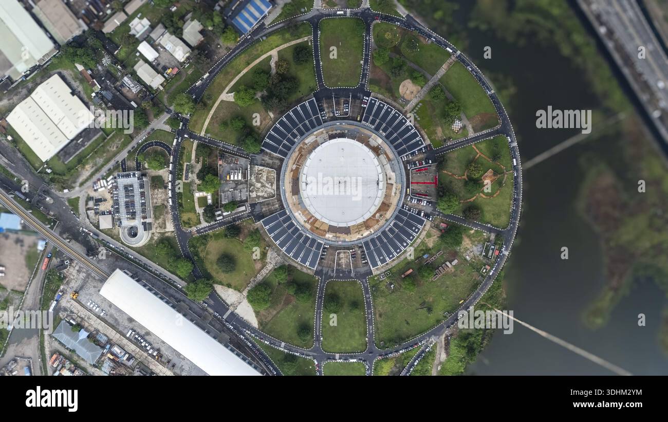 Aerial view of the National Theatre surrounded by lush greenery and ...