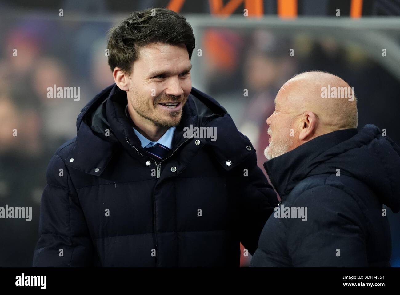 Rangers manager Danny Rohl (left) and Ludogorets manager Per-Mathias ...