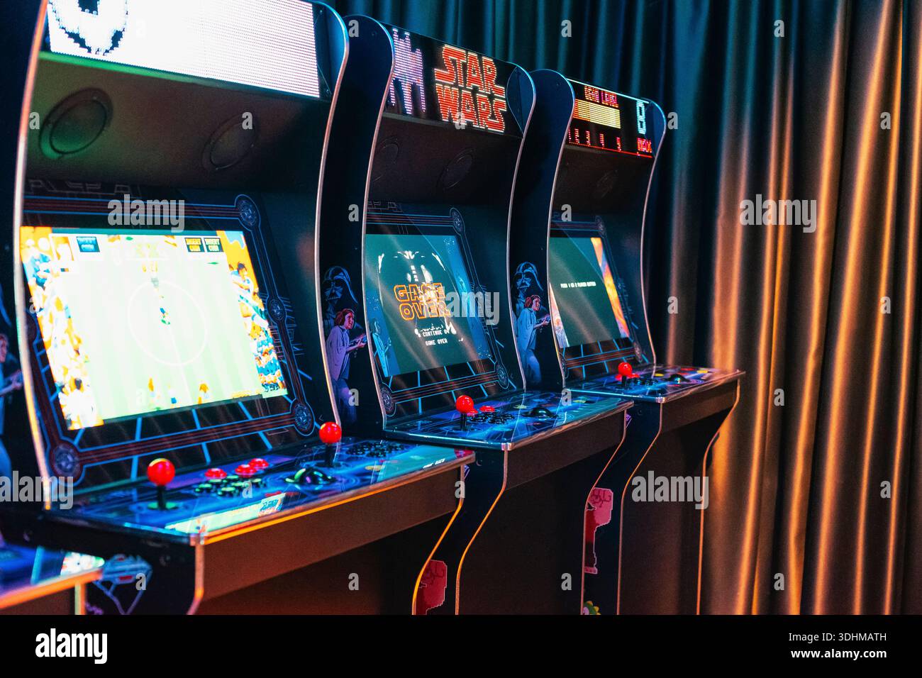 Zagreb Croatia - 10 January 2026: Row of illuminated retro arcade ...