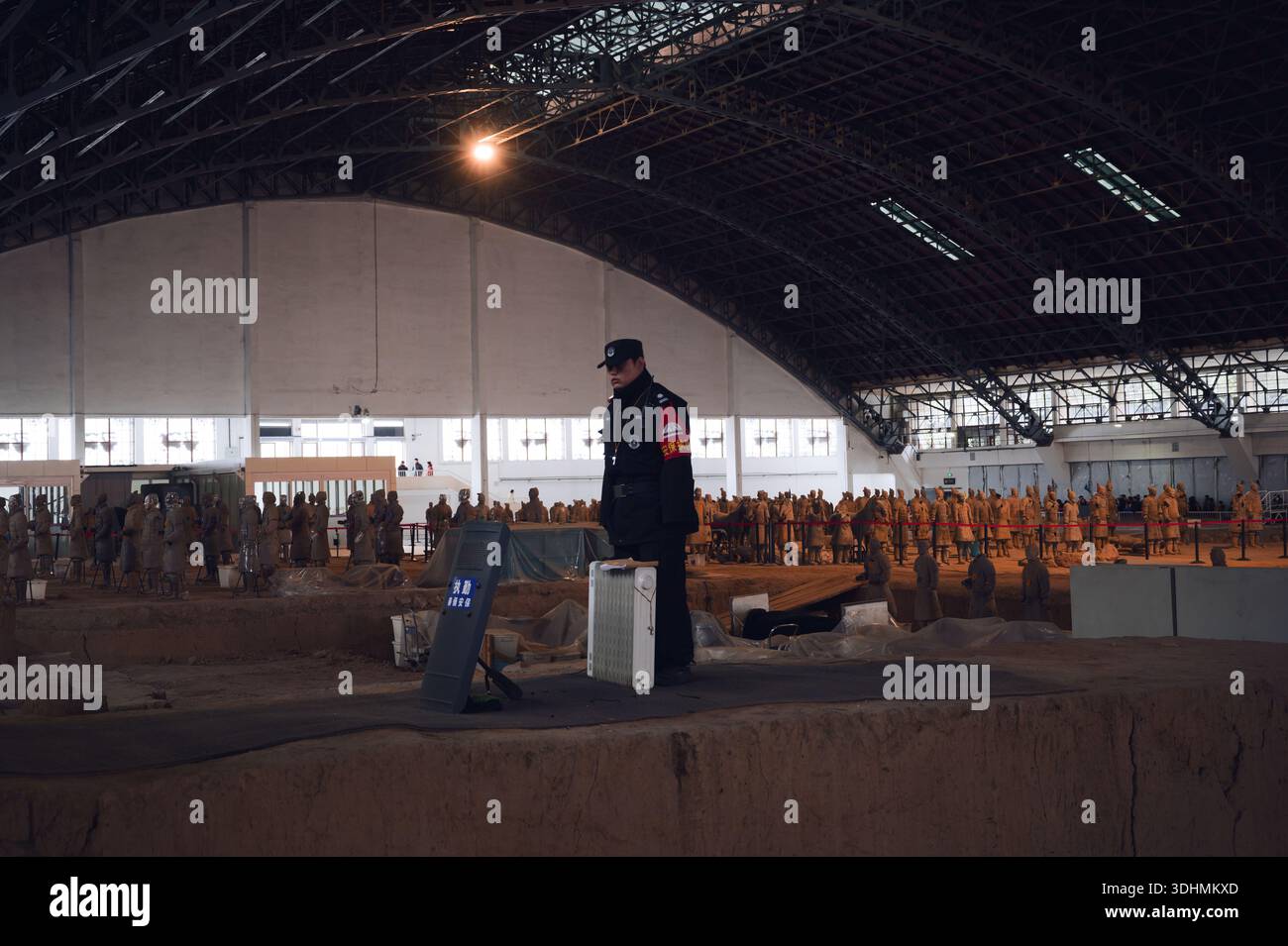 Security guard standing inside Pit 1 of the Terracotta Army at the ...