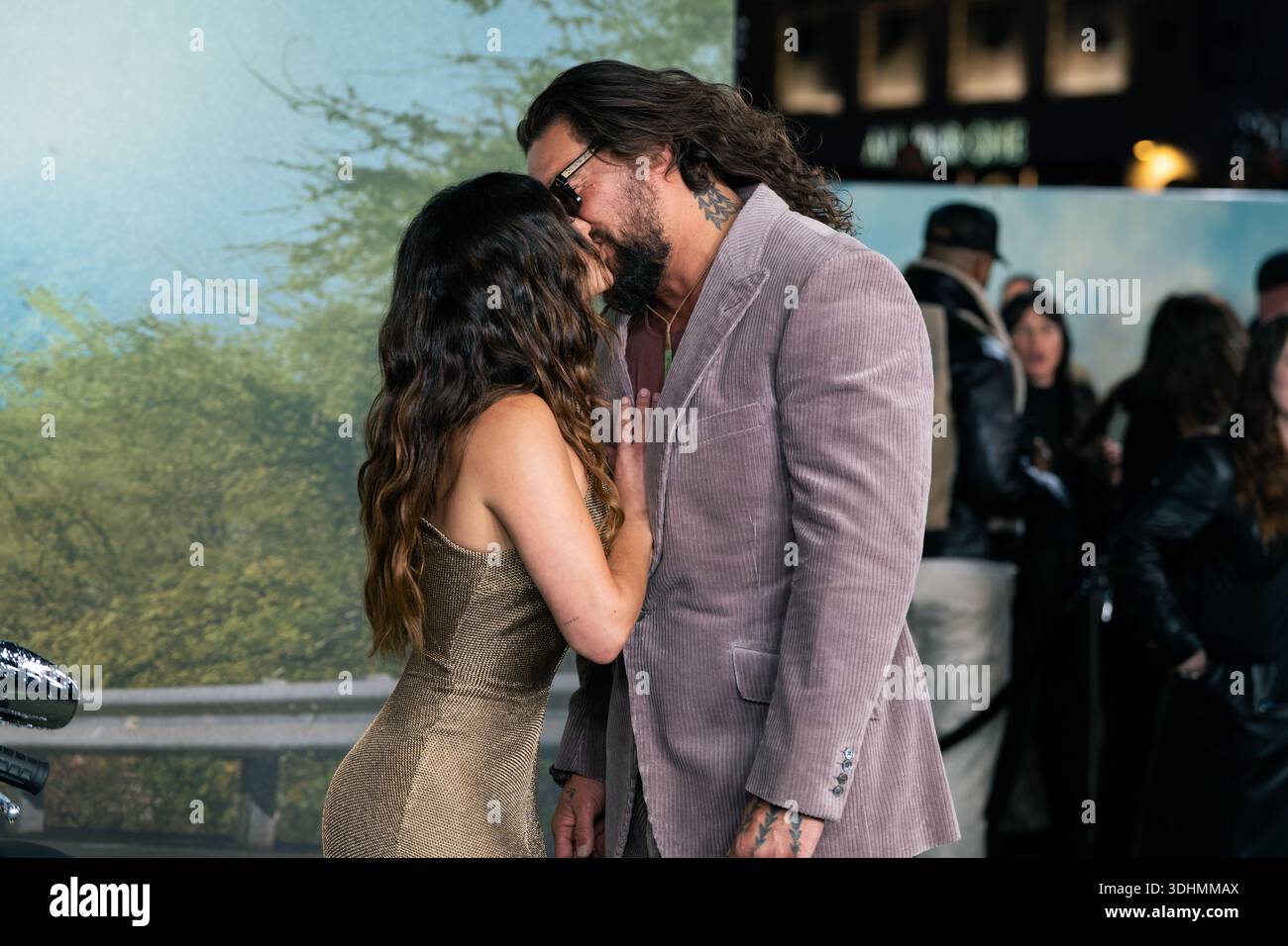 Adria Arjona and Jason Momoa kiss as they attend "The Wrecking Crew" UK ...