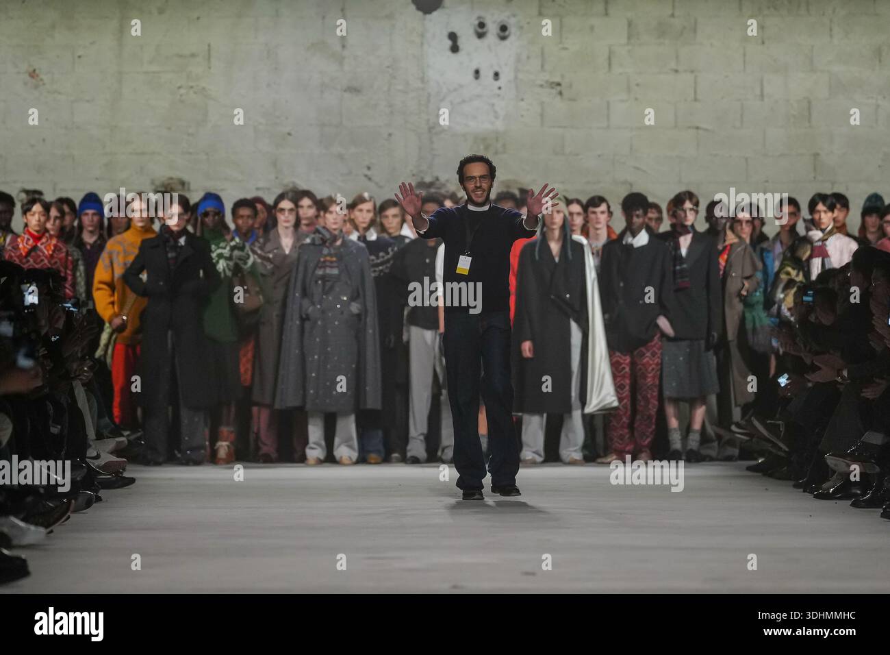 Designer Julian Klausner accepts applause after the Dries Van Noten ...