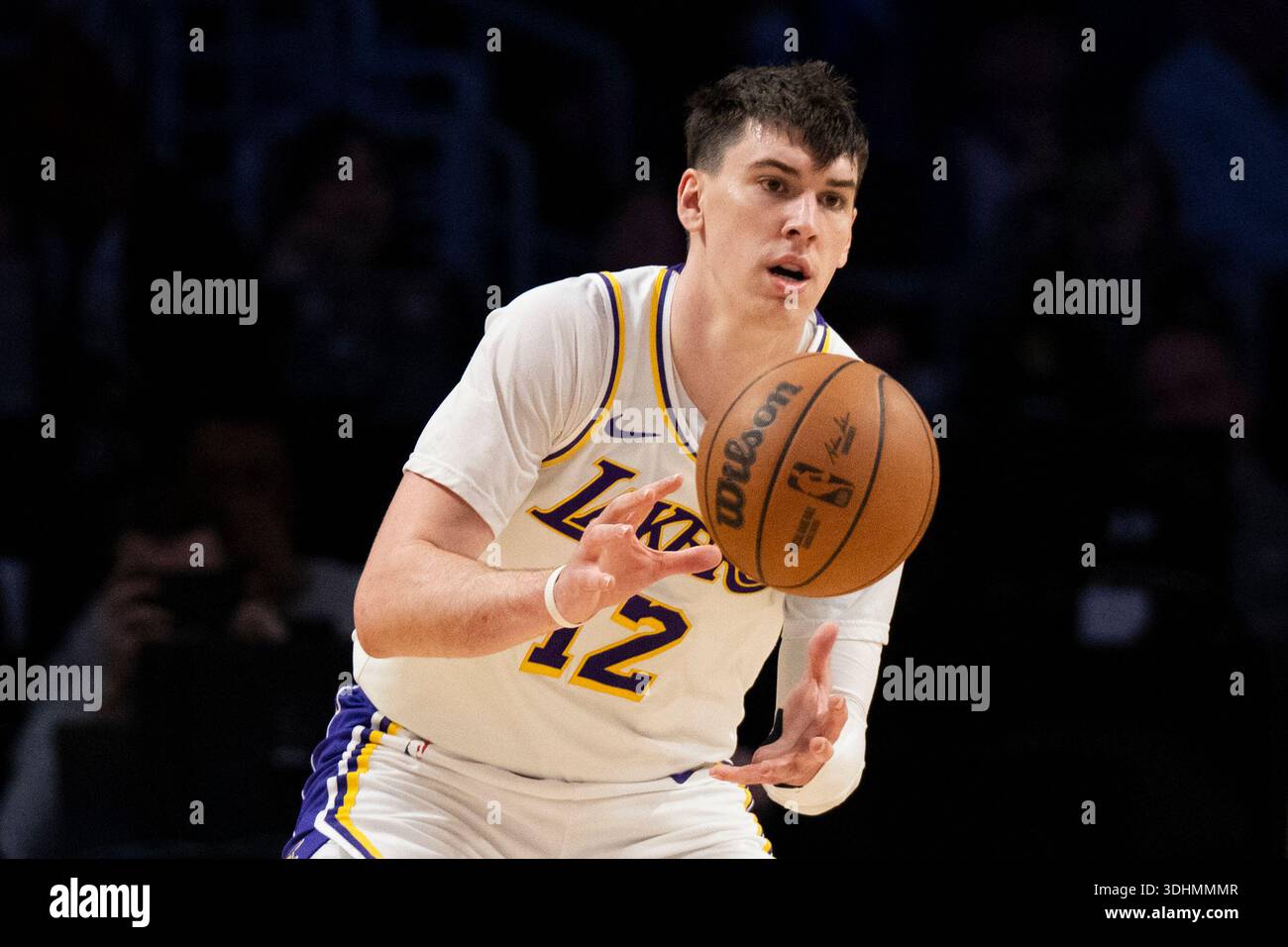 Los Angeles Lakers forward Jake LaRavia (12) catches the ball during an ...