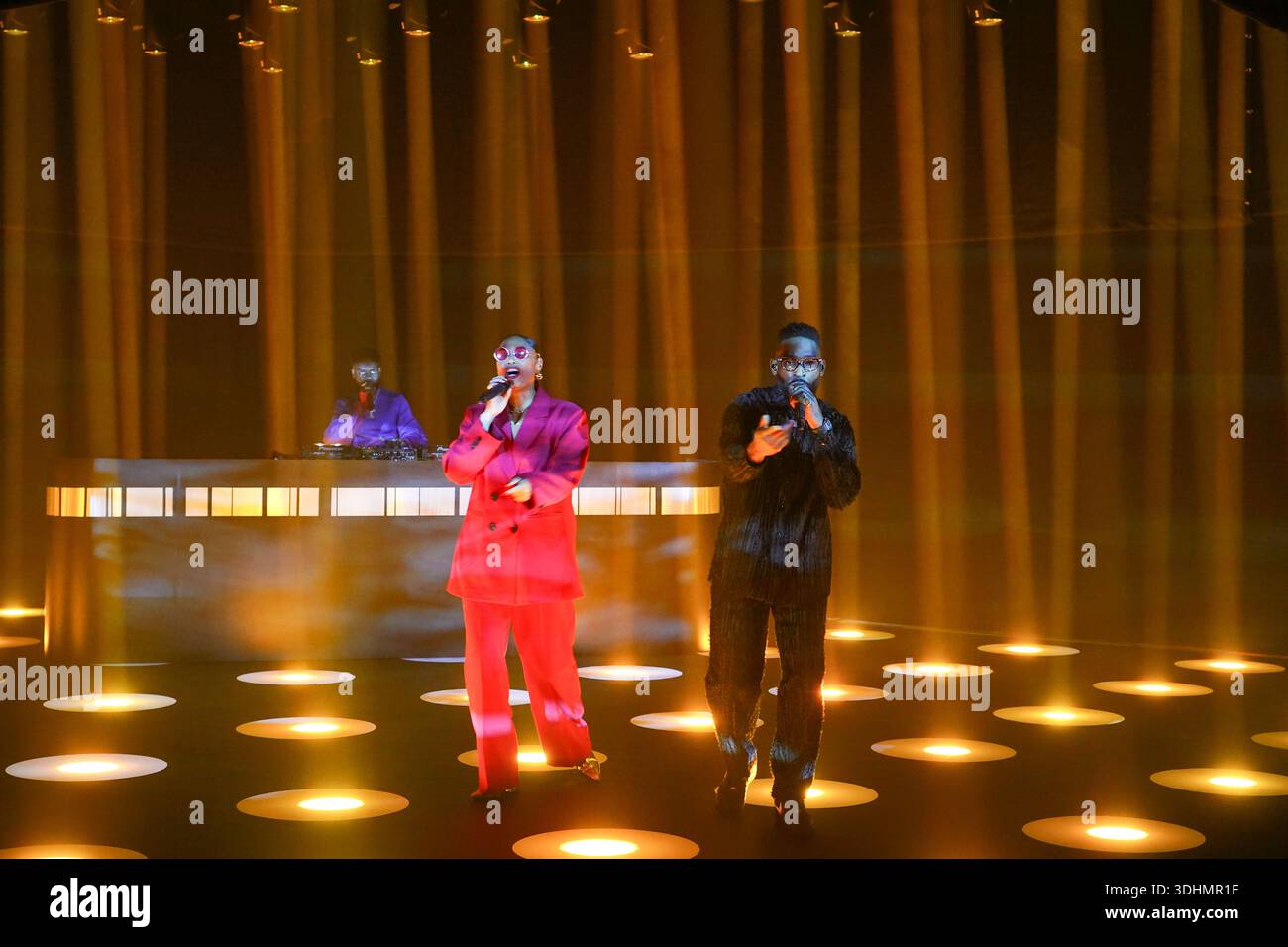 EDITORIAL USE ONLY Alex Mills and Tinie Tempah during filming for the ...