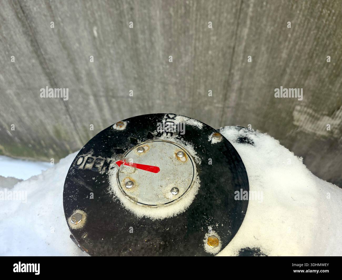 A black valve displays an open arrow indicator. The valve is located on ...