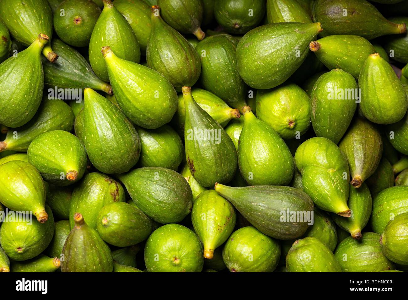 Figs for sale in a traditional Colombian market, highlighting the color ...