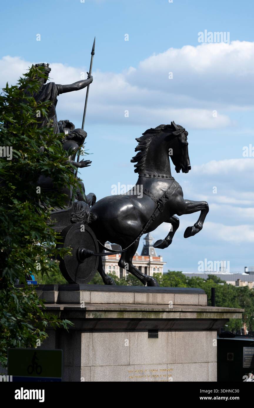 A bronze statue of Boudica, the ancient British queen, stands in a ...